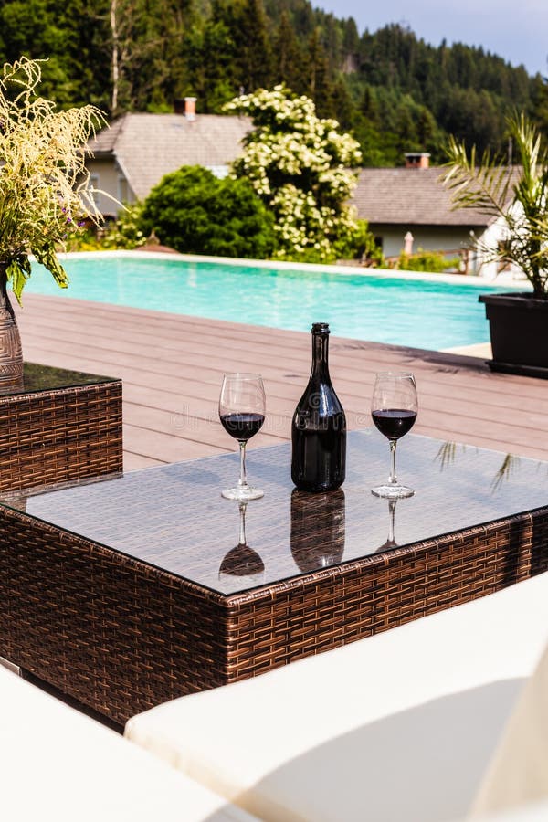 Wine on the pool stock image. Image of luxurious, contemporary - 58651507