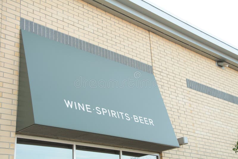Wine Spirits Beer White Writing Caption Text on Side of Store Building ...