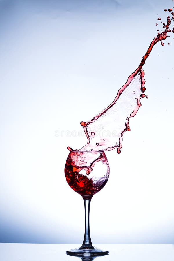 Wine splashing in glass stock photo. Image of movement - 82785570