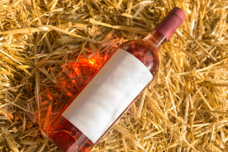 Wine on straw stock image. Image of wooden, alcohol - 217653299