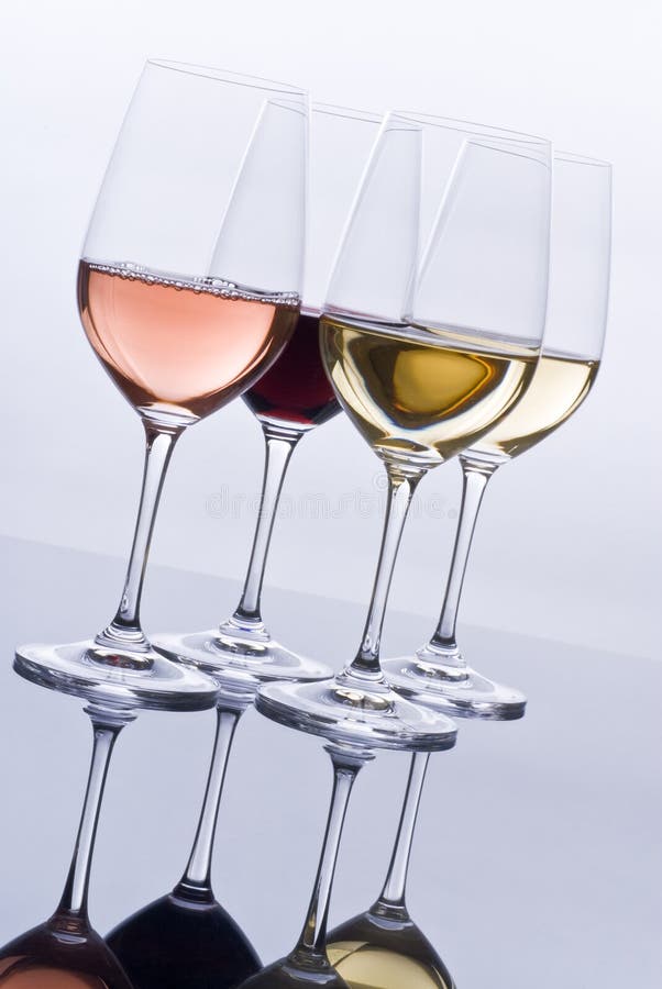 Wineglasses Filled with Colorful Wine Stock Photo - Image of beverage ...