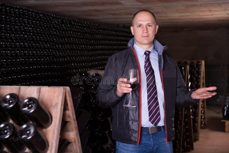 Winemaker Inviting To Tasting Red Wine Stock Photo - Image of excursion ... Winemaker Inviting To Tasting Red Wine Stock Photo - Image of excursion ...