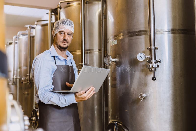 Winemaker Professional Working in Modern Large Winery Factory Liquor ...