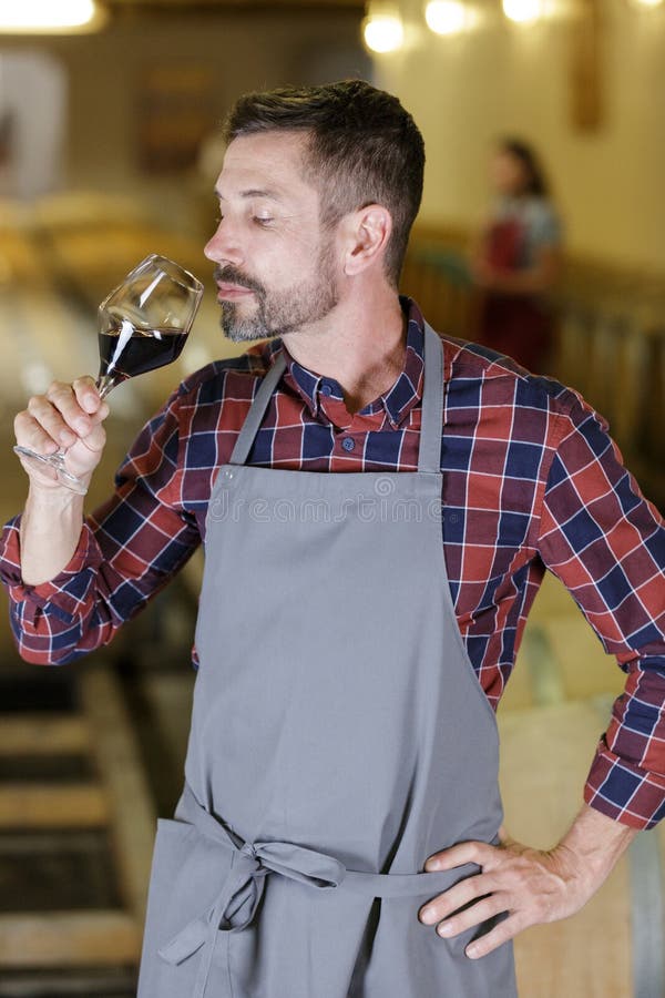 Winemaker Tasting Red Wine in Cellar Stock Image - Image of people ...