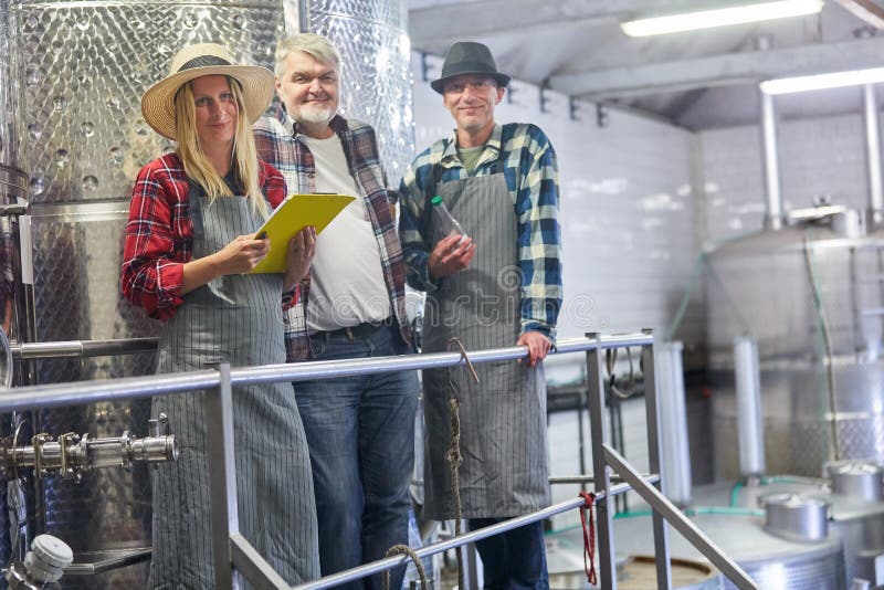 Winery Team with Cellar Master and Trainee Stock Photo - Image of ...