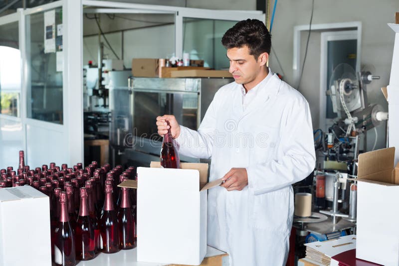 Winery Worker Packing Wine Bottles Stock Photo - Image of carton ...