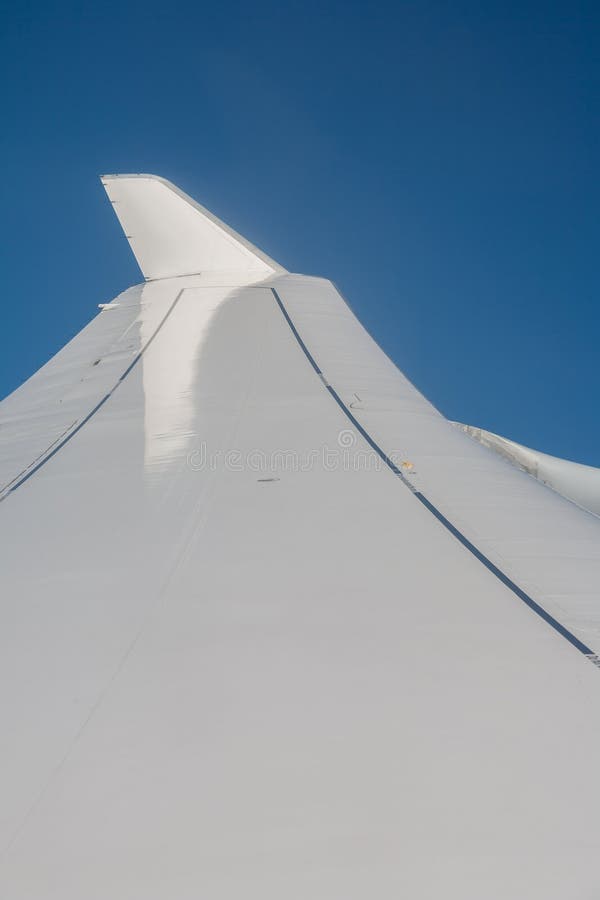 Wing of Aircraft in Blue Sky Stock Image - Image of flying, symbol ...