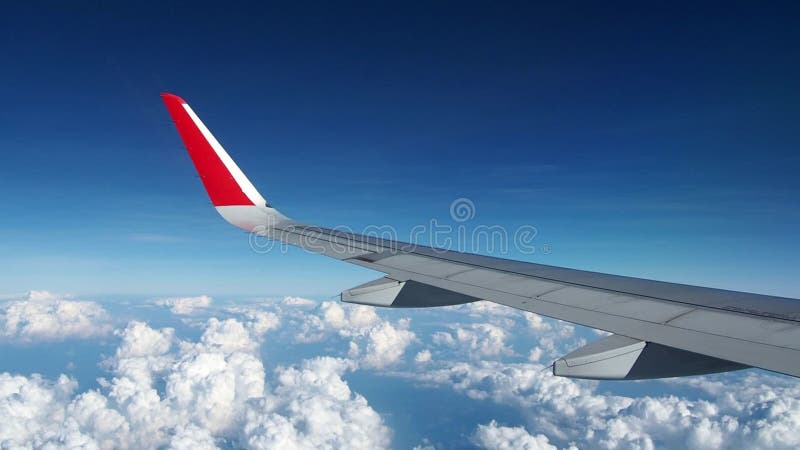 Wing Aircraft Flying in the Sky. the Tip of the Wing is Red Stock Video ...