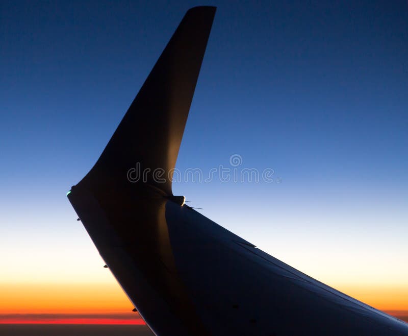 Wing aircraft at sunset stock image. Image of holiday - 111117045