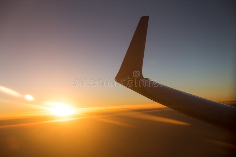 Wing aircraft at sunset stock image. Image of skyline - 111464407