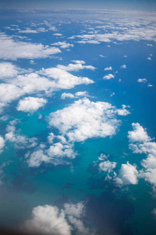 Wing of an Airplane Flying Above the Clouds Stock Photo - Image of ...