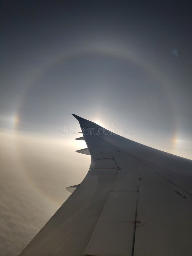 Wing of an Airplane Flying Above the Morning Clouds Stock Photo - Image ...