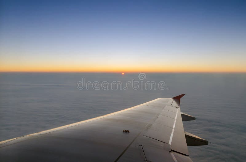 Wing of Airplane and Sunset Sky Stock Photo - Image of dusk, high: 59549436