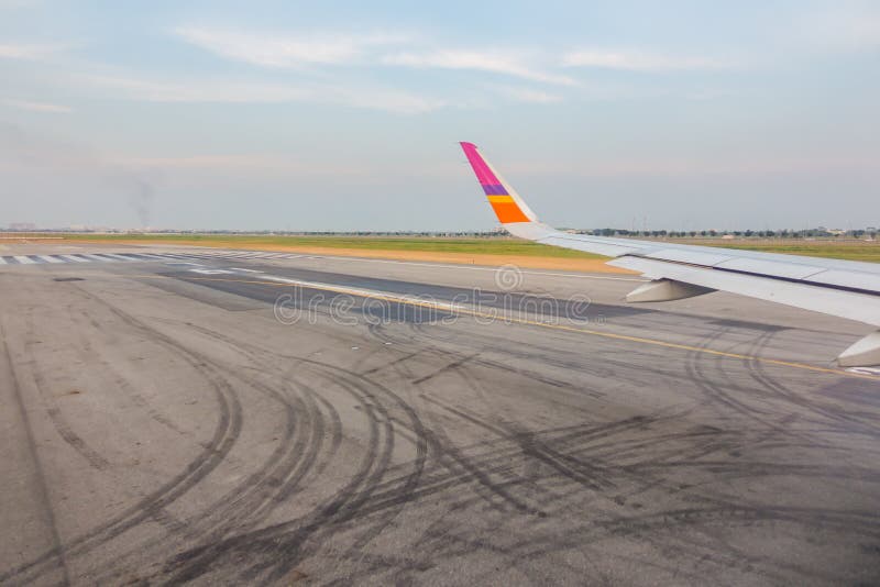 Wing while Breaking during Landing on Runway . Stock Image - Image of ...