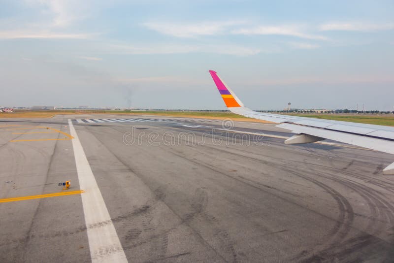 Wing while Breaking during Landing on Runway . Stock Image - Image of ...