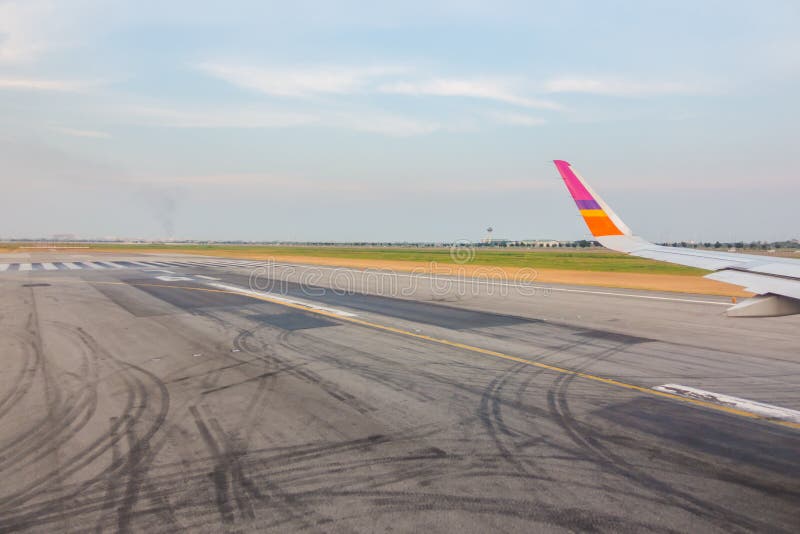 Wing while Breaking during Landing on Runway . Stock Photo - Image of ...