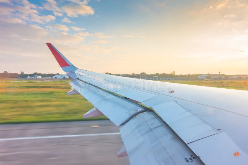 Wing while Breaking during Landing on Runway . Stock Photo - Image of ...