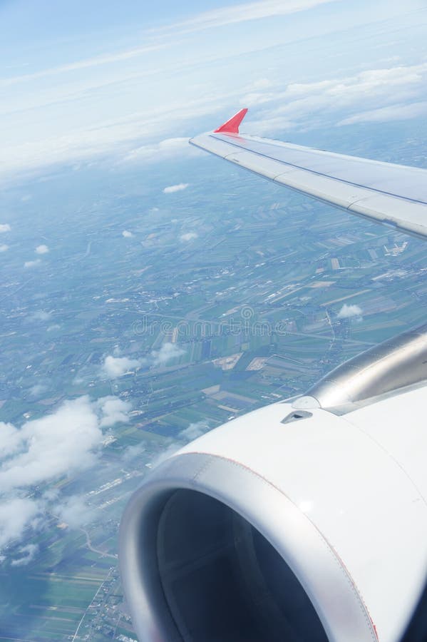 Wing and engine airplane stock photo. Image of flight - 95932962