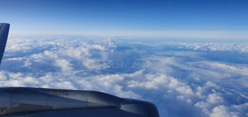 The Wing and the Engine Cover of an Aircraft in the Sky. Stock Photo ...