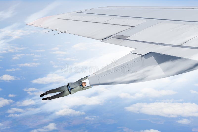 On wing of flying airplane stock image. Image of success - 64098917