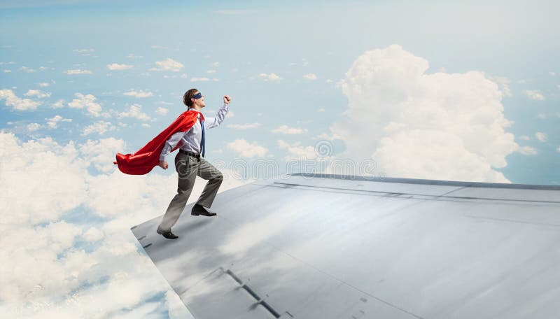 On wing of flying airplane stock photo. Image of young - 64152152