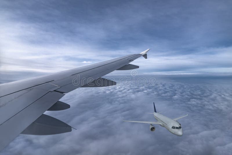 Wing of Jet and Airplane Fly in Sky Above Clouds. View from Plane ...