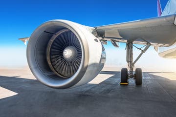 Wing Jet Engine of the Airplane at the Airport Apron. Stock Image ...