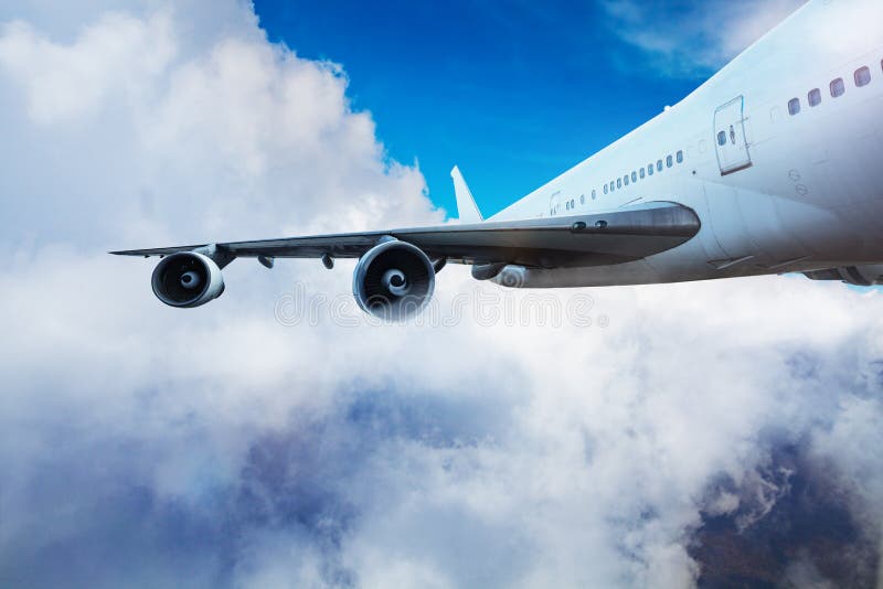 Wing and Jet Engines Crop of an Airplane Flying Stock Image - Image of ...