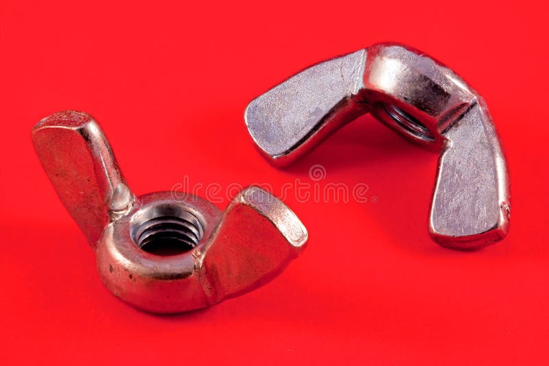 Wing nuts close-up stock image. Image of metal, colour - 73064715
