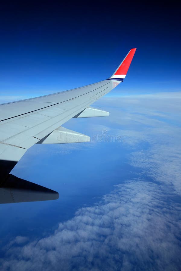 The Wing of a Plane during the Flight. Stock Image - Image of holiday ...