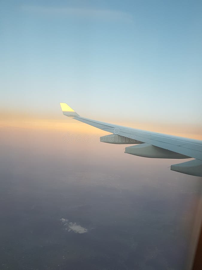 Wing stock image. Image of winter, sunrise, plane, scenery - 103863851