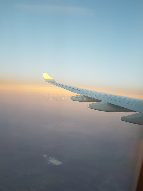 Wing stock image. Image of winter, sunrise, plane, scenery - 103863851