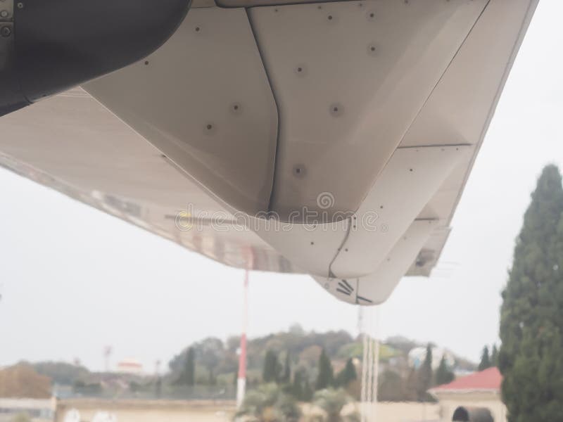 The Wing of a Small Plane Standing on the Runway. View from the ...