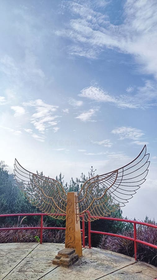 Wing Statue for Tourism Photo Spot with Blue Sky and White Clouds ...