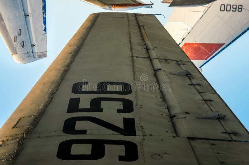 Wing with Tail Number on the Background of Airplanes and Blue Sky Stock ...