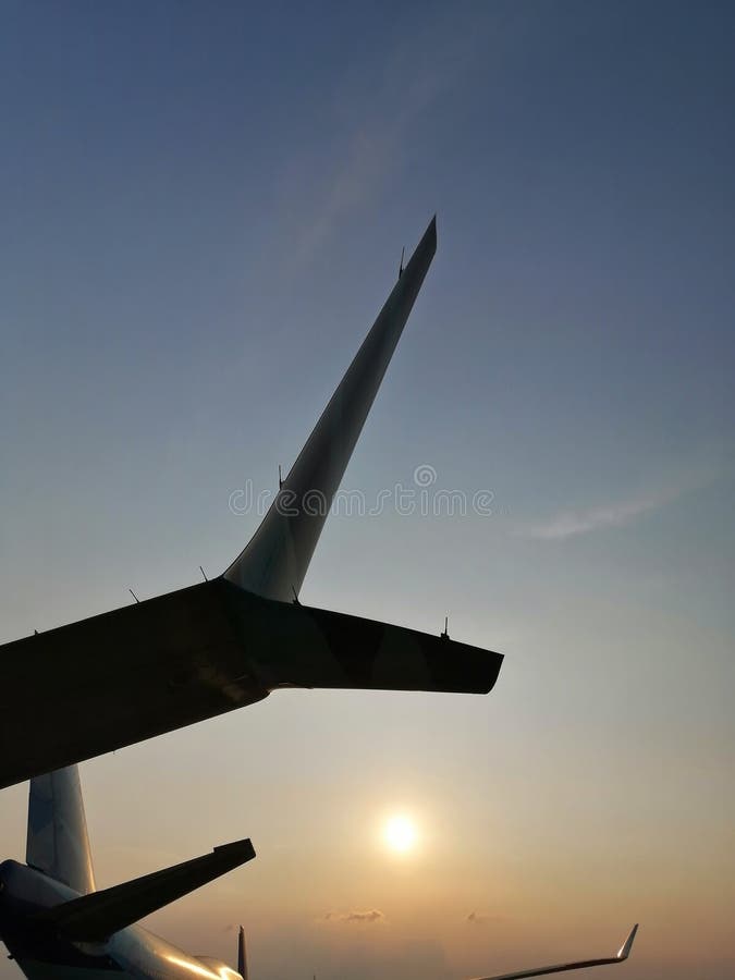 Wing Tip of Aircraft in Afternoon Stock Image - Image of background ...