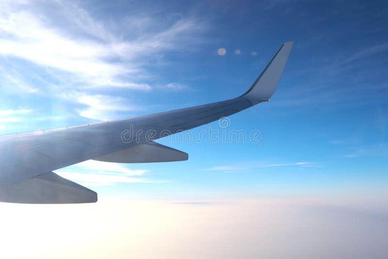Wing Tip Airplane and Clouds Stock Photo - Image of wing, evening ...