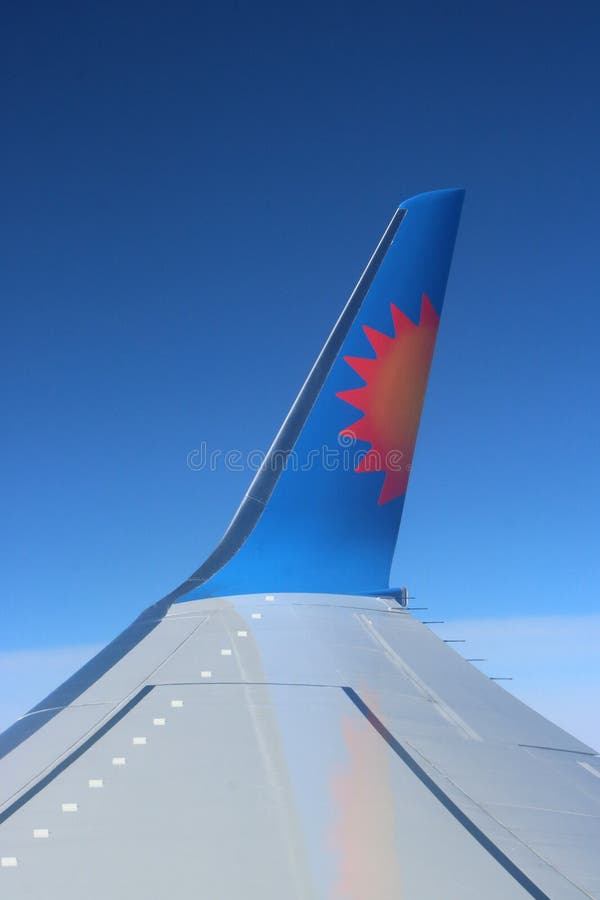 Wing Tip Boeing 757 in Flight Against Blue Sky Editorial Photo - Image ...