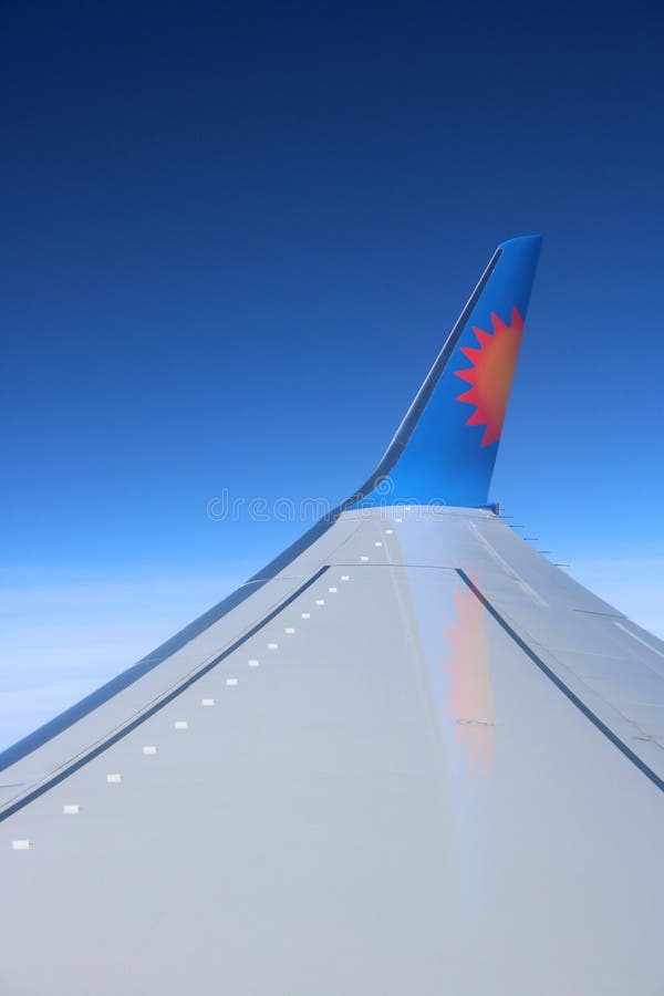 Wing Tip Boeing 757 in Flight Against Blue Sky Editorial Stock Photo ...