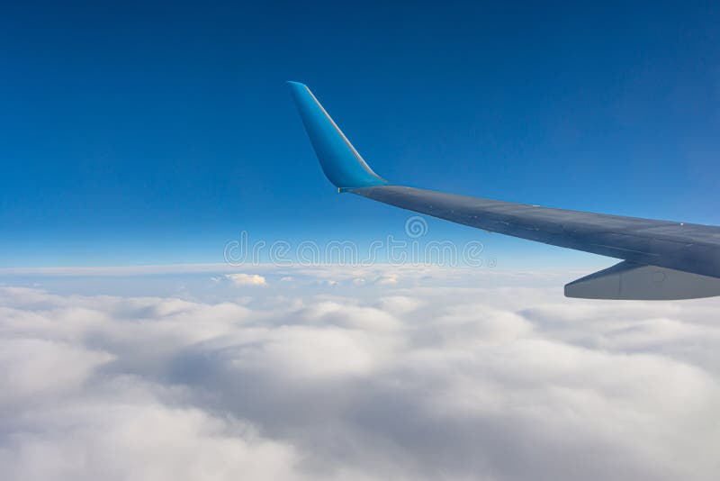 Wing View of the Airplane on a Winglets, Stratus Clouds on the Skyline ...