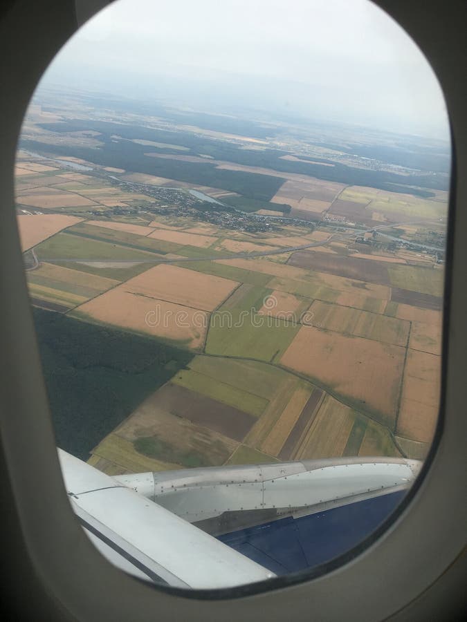 Wing view from a plane stock image. Image of view, flight - 83385565