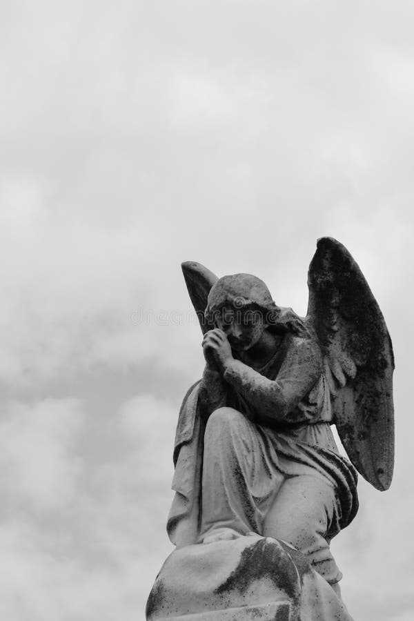 Winged Angel Sculpture stock image. Image of preying - 90046393