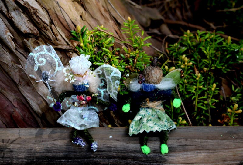 Winged Faeries in Faerie Garden Stock Image - Image of lore, fairy ...