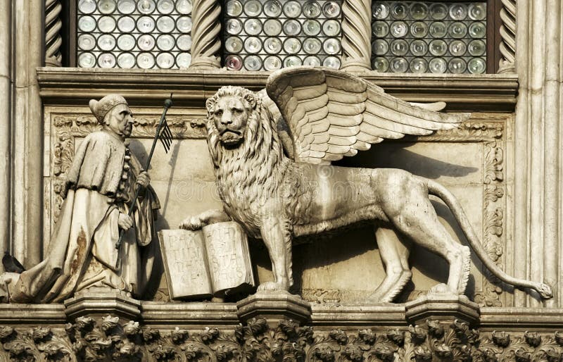 The Winged Lion of St Mark Statue Stock Photo - Image of book, saint ...