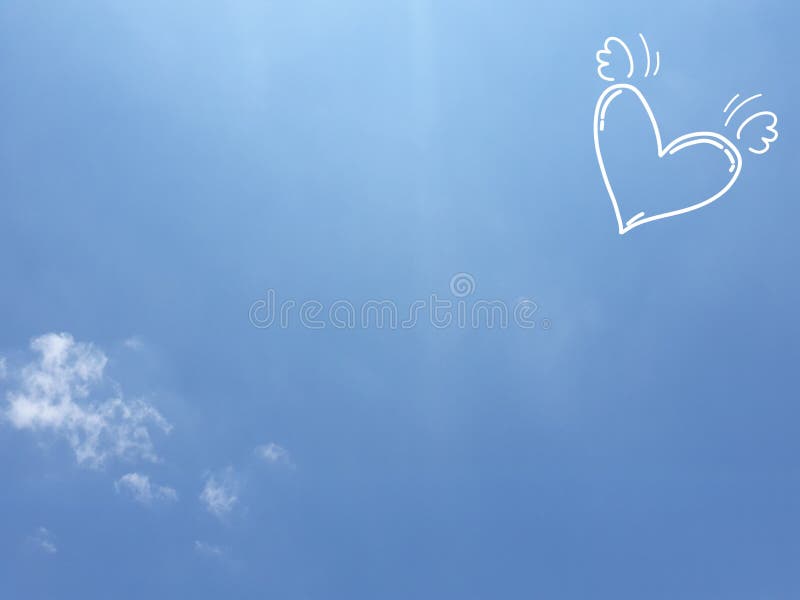 A Winged White Heart in White Color Over a Blue Sky Background Stock ...