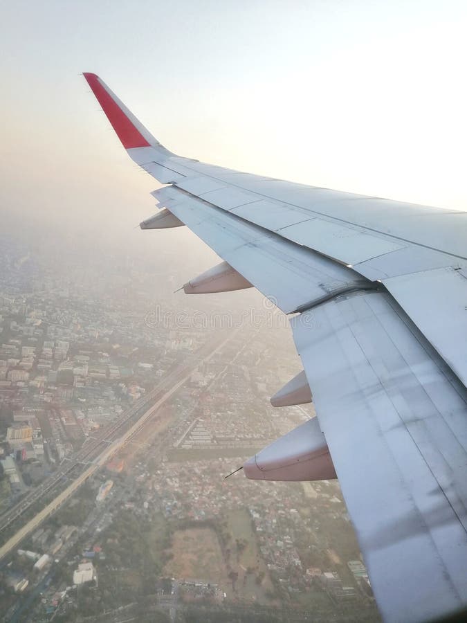 Wings Flying on the Horizon with Over Traffic View Stock Photo - Image ...