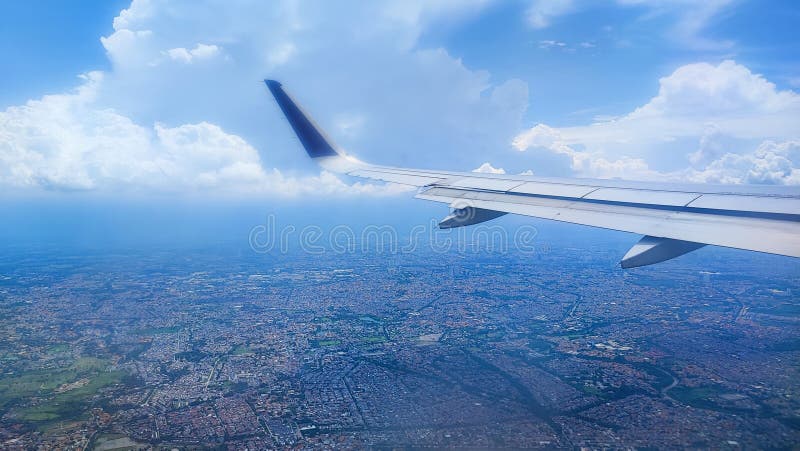Wings of Plane in the Blue Sky and Earth Stock Photo - Image of ...