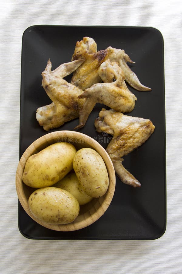 Wings and potatoes stock photo. Image of natural, potato - 62420274