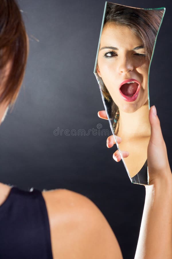 Wink in the mirror stock image. Image of reflection, female - 48422707