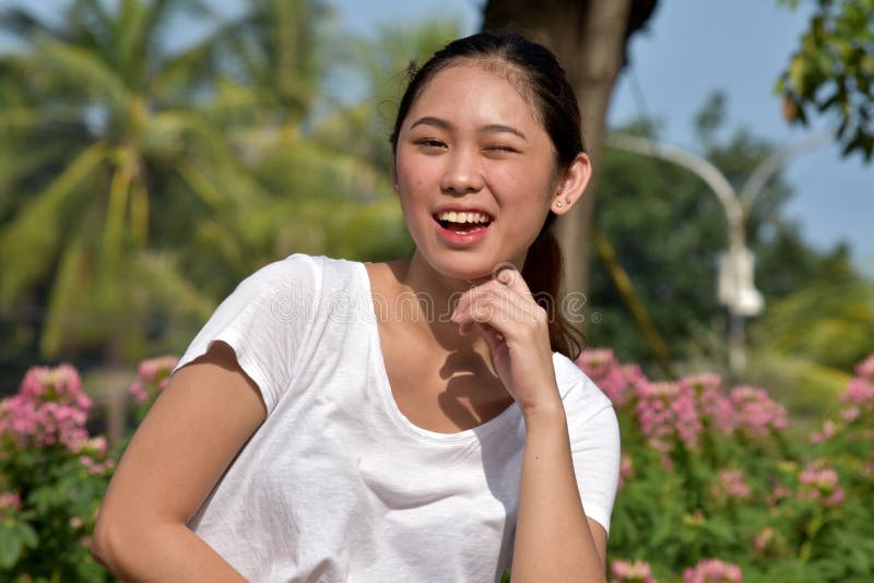 Winking Beautiful Female stock photo. Image of wink - 130655940